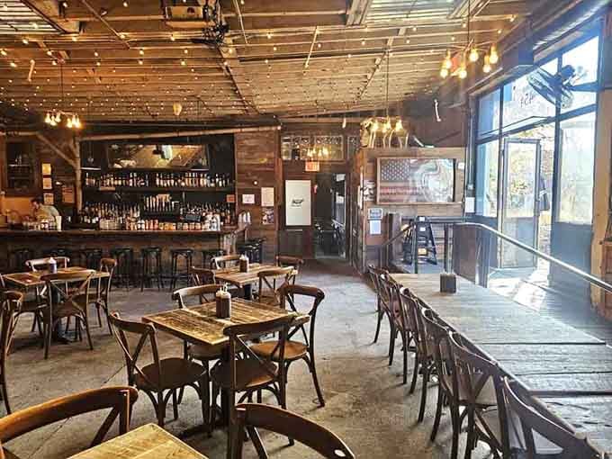 String lights and rustic wood create the kind of atmosphere where strangers become friends over shared meat platters.