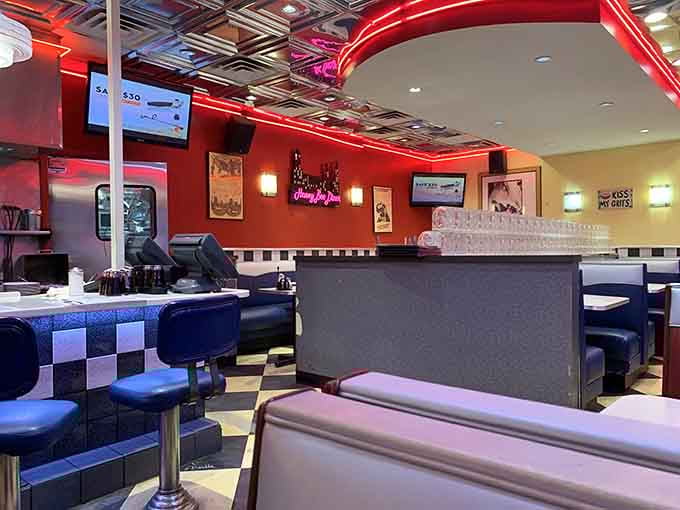 Step inside and the 1950s don't just whisper, they sing in neon pink and electric blue glory.