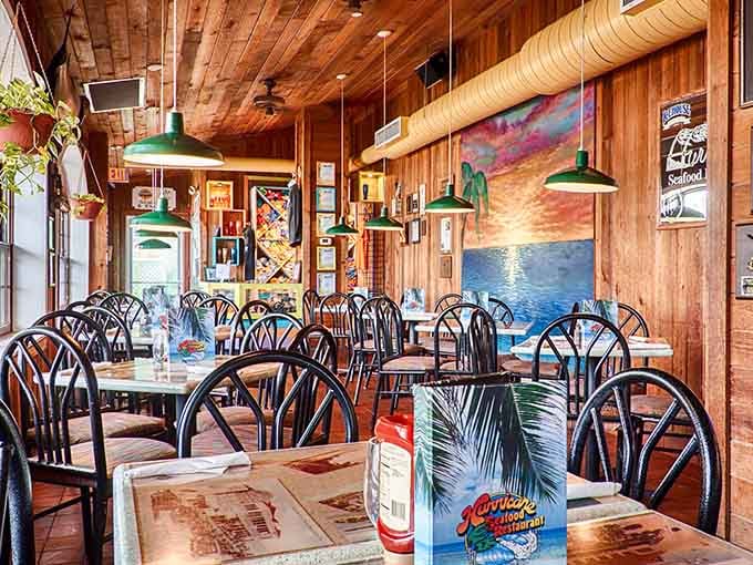 Wood-paneled walls and green pendant lights create the kind of cozy atmosphere where grouper sandwiches taste even better somehow.