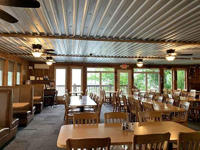 Corrugated tin ceilings and wooden chairs create an atmosphere that's equal parts rustic charm and small-town nostalgia.