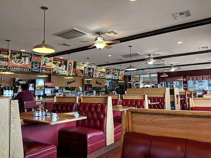 Red vinyl booths and vintage signs create the perfect backdrop for serious breakfast business in Safford.