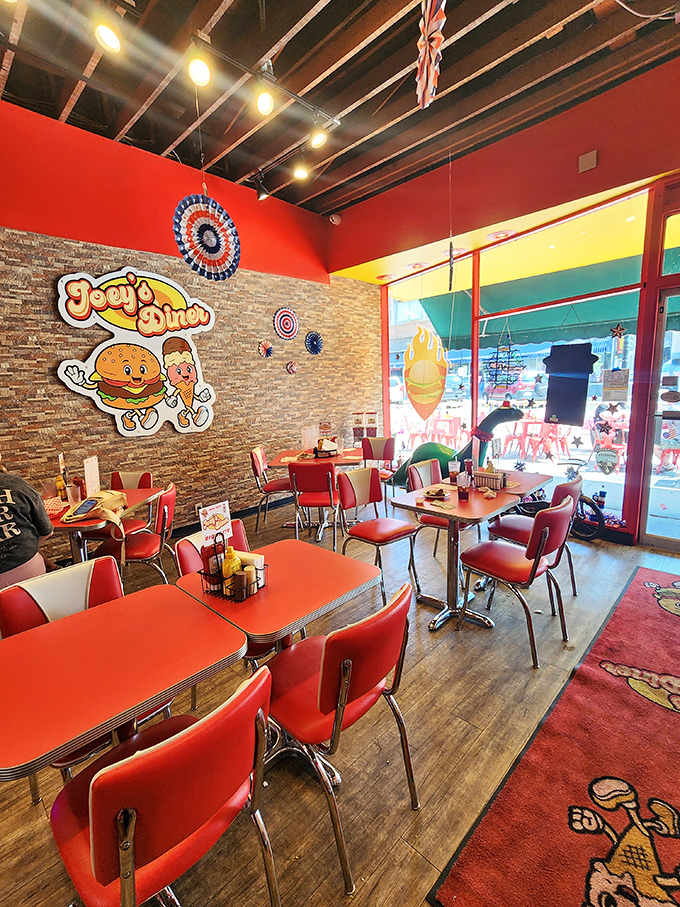 Chrome-trimmed tables and red vinyl seating create a time warp where calories don't count and Elvis still reigns.