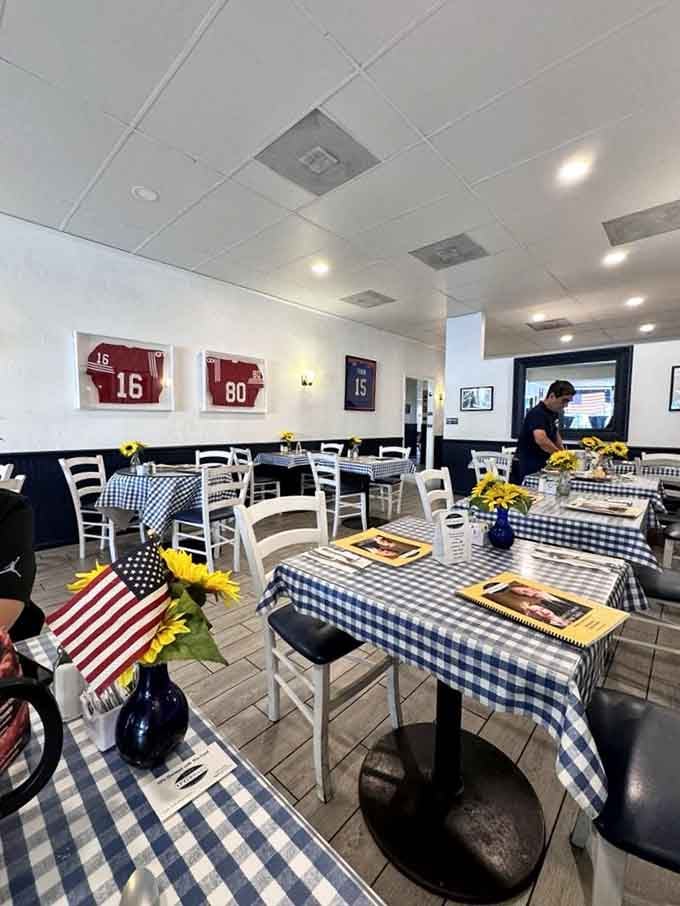 Checkered tablecloths and fresh sunflowers create the kind of cheerful atmosphere that makes early mornings feel worthwhile.