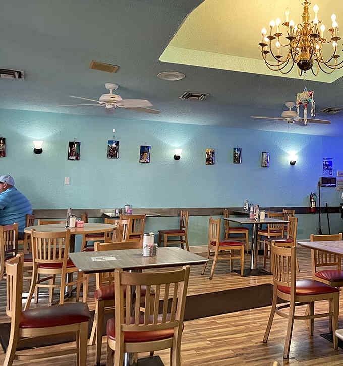 The chandelier says fancy, the vibe says family, and somehow it all works perfectly together.