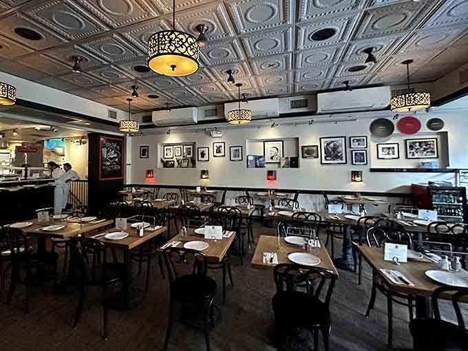 Tin ceilings and vintage photographs create an atmosphere that feels like stepping into a time machine.