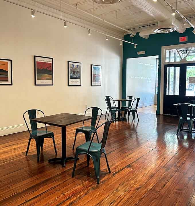 Clean lines and warm wood floors create a welcoming space where ancient chocolate traditions meet modern comfort.