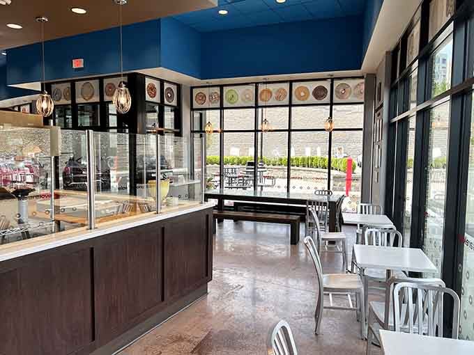 Clean lines, blue accents, and a display case full of temptation make this the happiest place on earth.