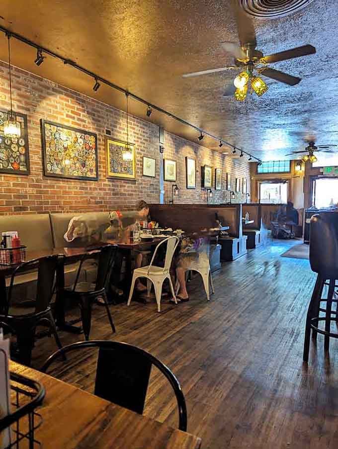 Exposed brick walls and tin ceilings create the kind of atmosphere that makes you want to settle in for hours.