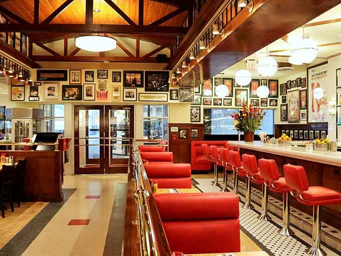 Red vinyl booths and vintage photographs create a time machine that runs on corned beef and nostalgia.