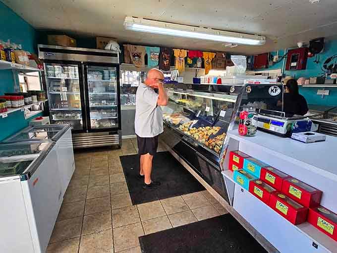 Behind that counter lies the freshest catch you'll find, displayed like edible treasure in a working fish market.