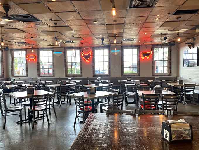 Those glowing neon cattle on the walls aren't just decoration, they're basically announcing you've arrived at beef heaven.