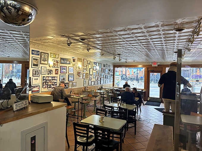 The memorabilia-covered walls create an atmosphere where nostalgia meets hunger in the most delicious way possible.