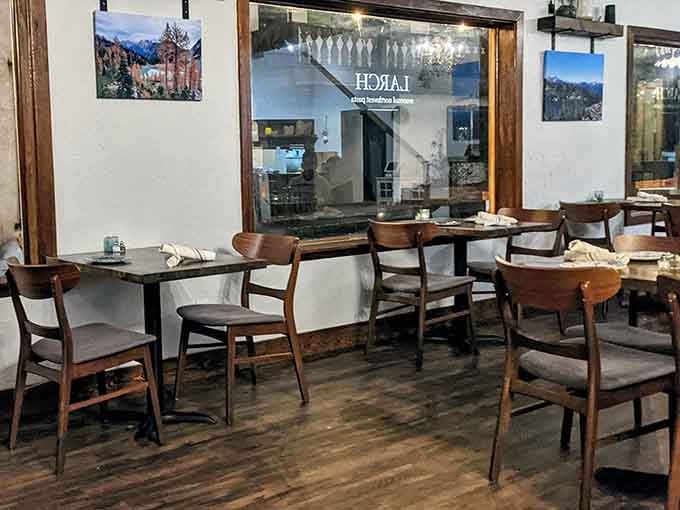 Clean lines and warm wood create the kind of space where conversations flow as smoothly as the wine.