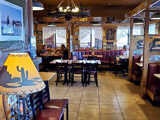 Cozy booths and Western charm create the kind of atmosphere where strangers become friends over dinner.