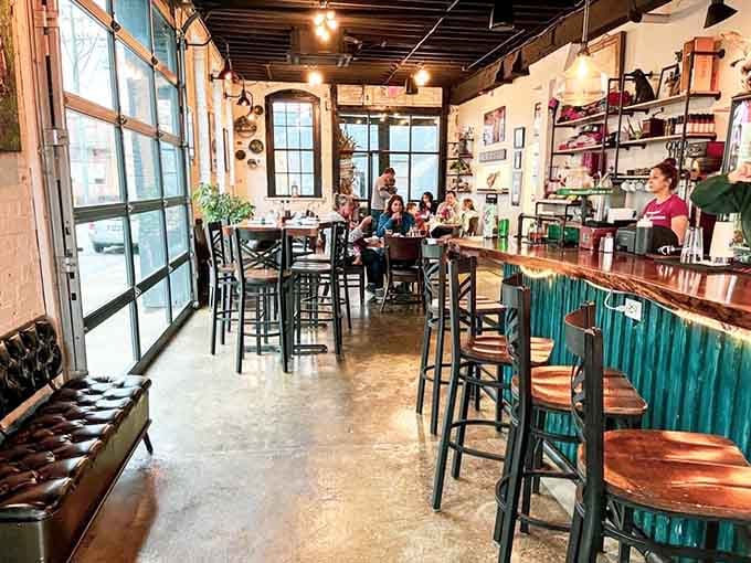 Exposed brick, warm lighting, and corrugated metal create the perfect backdrop for serious eating and easy conversation.