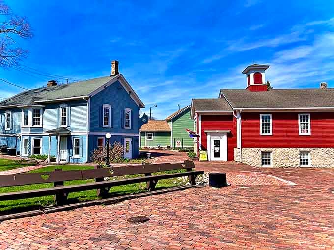 Brick paths lead past historic structures painted in hues that would make Norman Rockwell reach for his brushes.