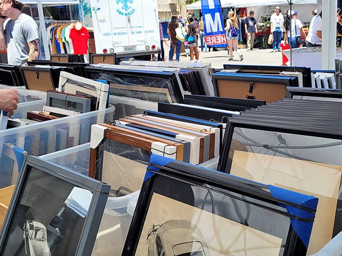 Picture frames lined up like memories waiting for their next chapter in someone's new home.