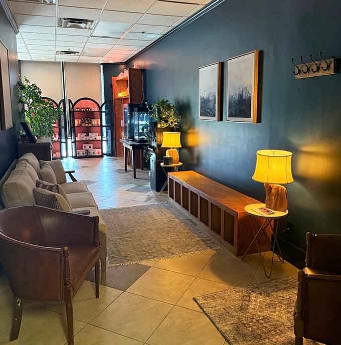 The waiting area whispers relaxation before you even reach the cave, complete with plants and calming artwork everywhere.