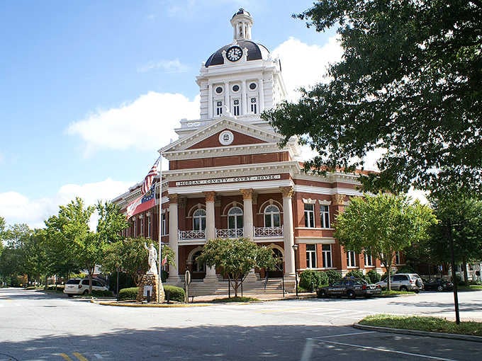 The courthouse clock tower keeps perfect time, unlike your retirement schedule which is gloriously nonexistent now.