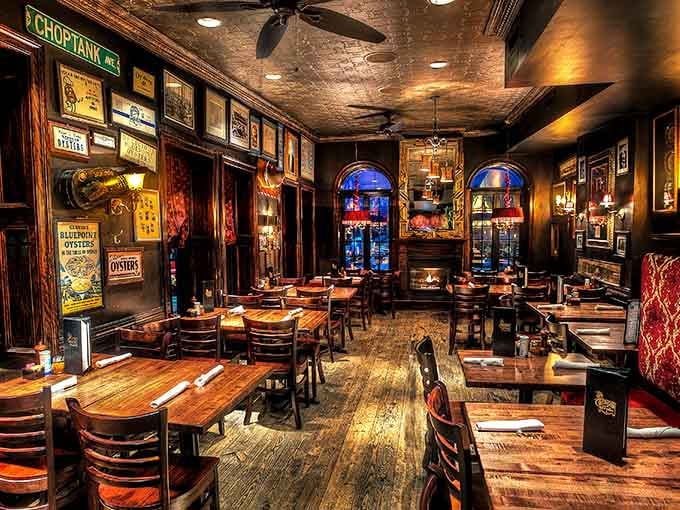 Dark wood, vintage oyster posters, and that gorgeous tin ceiling create atmosphere you simply cannot manufacture or fake.