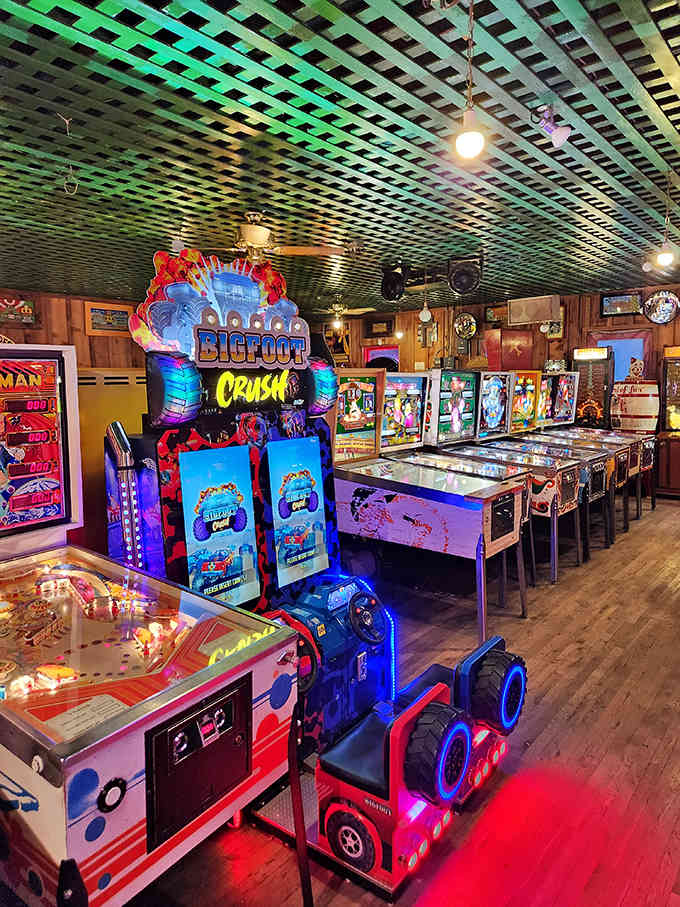 Rows of pinball machines and vintage games create a symphony of bells, lights, and pure nostalgic joy.