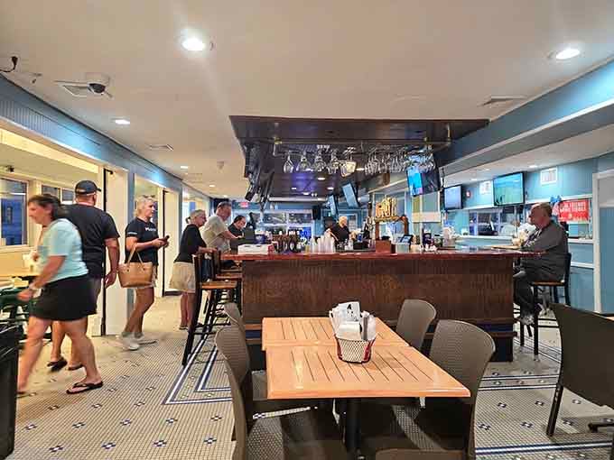 Inside, it's all about casual comfort where families gather and pizza dreams come true over cold drinks.