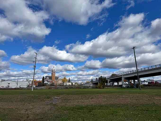 Those dramatic clouds rolling over the town clock create a postcard moment that costs absolutely nothing to enjoy daily.