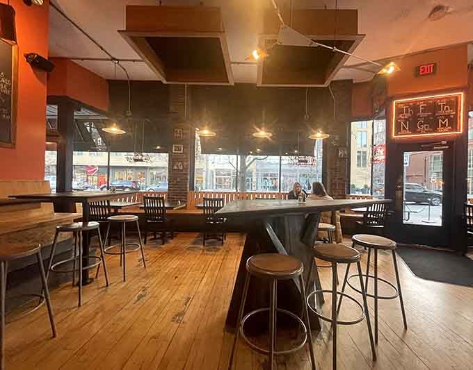 Industrial meets intellectual in this airy space where exposed brick and hardwood floors create the perfect laboratory for good times.