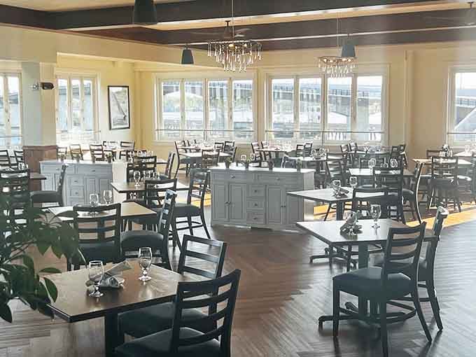 Floor-to-ceiling windows frame the harbor views while you contemplate your third round of eggs benedict and zero regrets.