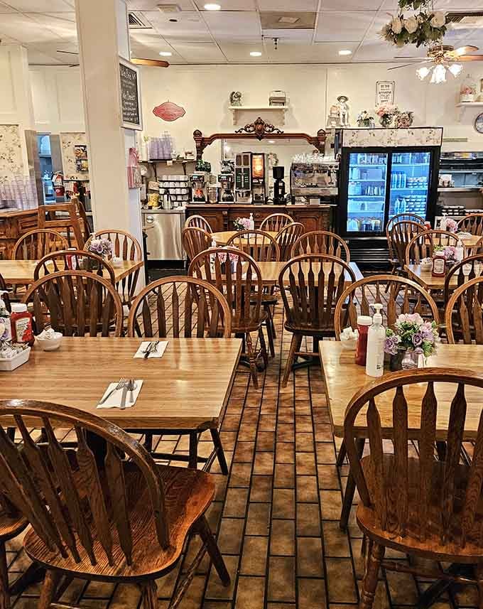 Wooden chairs and floral touches create that homey vibe where calories mysteriously don't count.