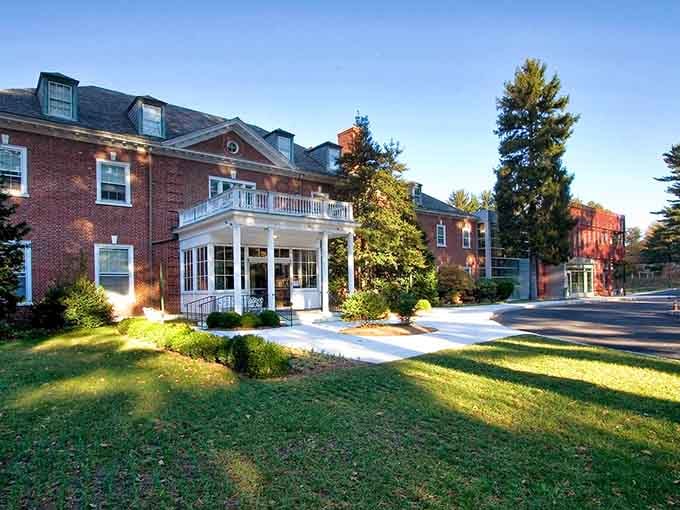 Sunlight dances across the red brick facade of this grand building, welcoming you to explore the history and art inside.