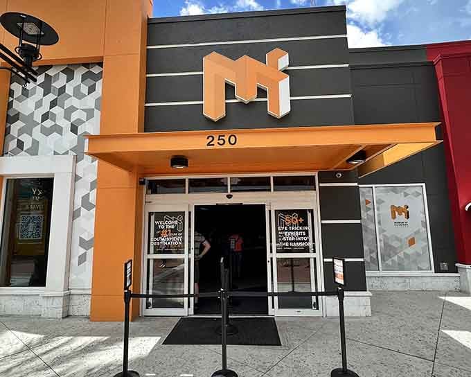 That distinctive orange logo is your first clue that reality is about to get seriously weird inside.