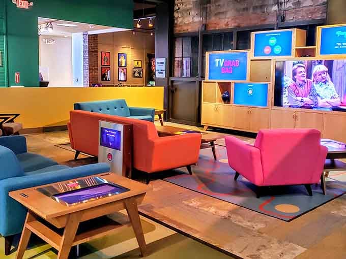 Mid-century modern furniture meets interactive comedy exhibits, because apparently laughing is better when you're sitting in a really cool chair.