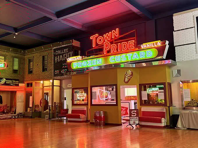 The Town Pride frozen custard sign still beckons with rainbow promise, ready to satisfy sweet cravings across the decades.