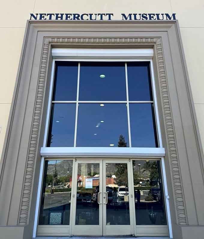 The entrance whispers elegance before you even step inside, like a formal invitation to automotive heaven.