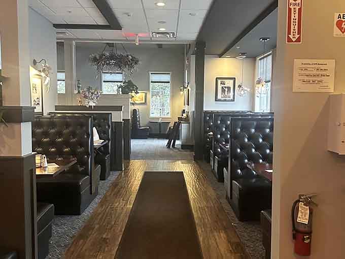 Those tufted booths and warm lighting create the kind of atmosphere where memorable meals happen naturally.