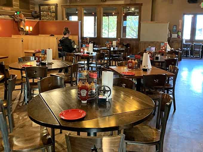 Spacious tables and warm lighting create the perfect setting for serious rib-eating without judgment from strangers.