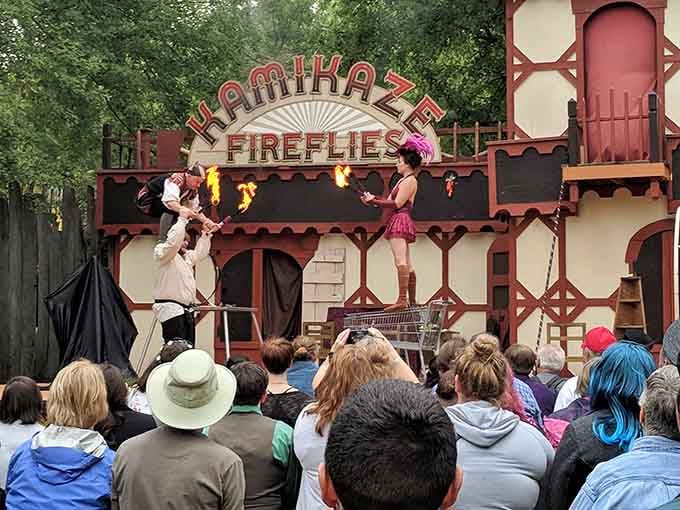 The Kamikaze Fireflies juggle actual flames because apparently regular juggling wasn't exciting enough for these overachievers.