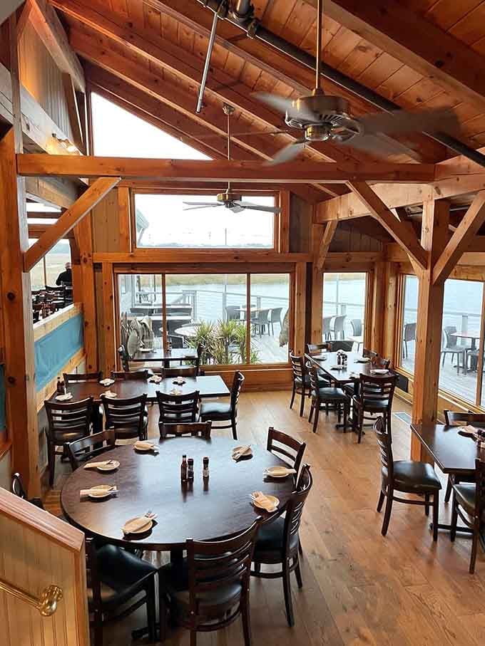 Floor-to-ceiling windows frame Broad Creek like nature's own dining room art, complete with ever-changing water views.