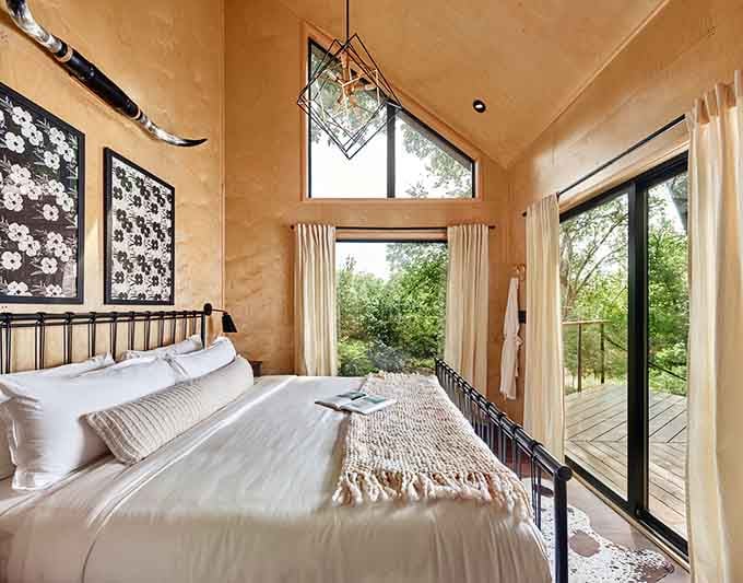 Floor-to-ceiling windows frame nature like the world's most expensive art gallery, except the view never gets old.