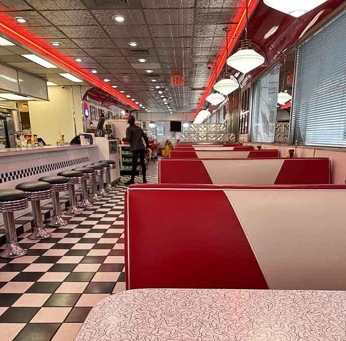 Red vinyl booths and checkered floors create the perfect setting for serious pancake contemplation and life decisions.