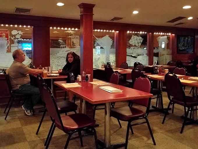 Inside, those long communal tables have witnessed countless pizza victories and even more delicious defeats over the decades.