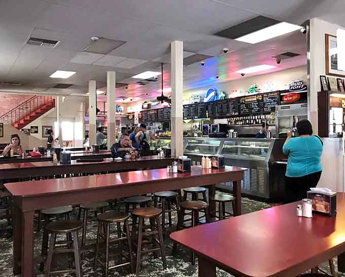 Sawdust floors and communal tables: where strangers become friends united by their love of gravy-soaked bread.