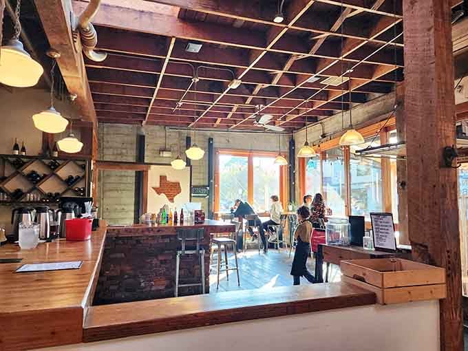 Inside, exposed beams and warm lighting create the perfect backdrop for your upcoming barbecue adventure.