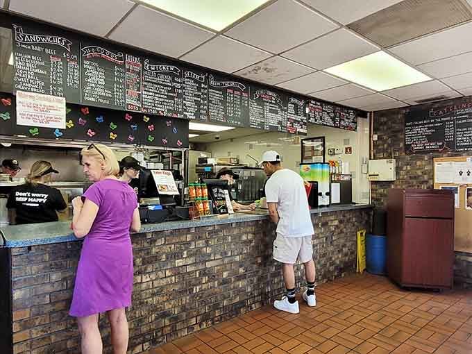 Counter service at its finest, where chalkboard menus and tile walls set the stage for sandwich magic.