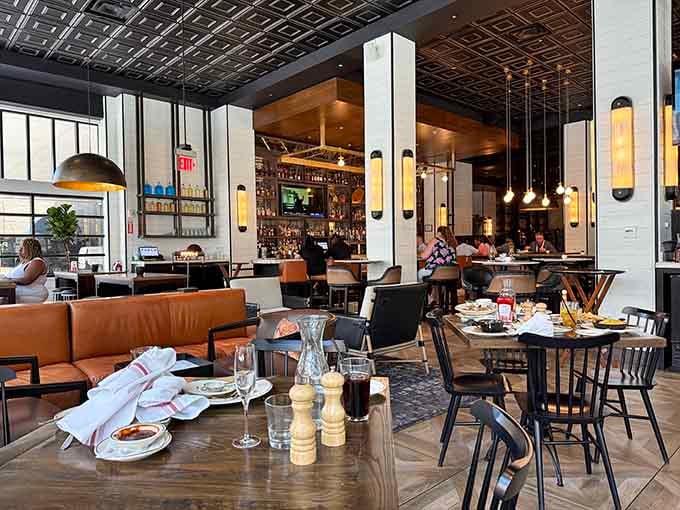 The dining room at Porch Kitchen & Bar blends modern design with genuine warmth and comfort.