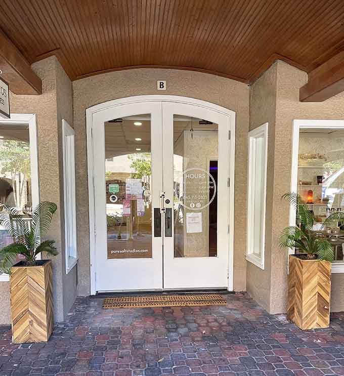 That welcoming entrance practically begs you to leave your stress at the door, right next to those charming planters.