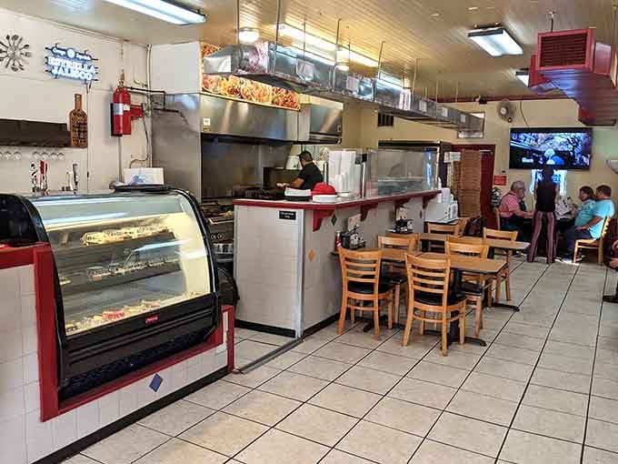 The open kitchen layout means you can watch your cheesesteak being crafted, which builds anticipation better than any appetizer could.