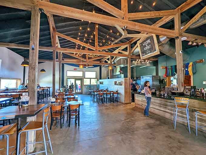 Those soaring wooden beams and string lights create an atmosphere that's equal parts mountain lodge and barbecue heaven.