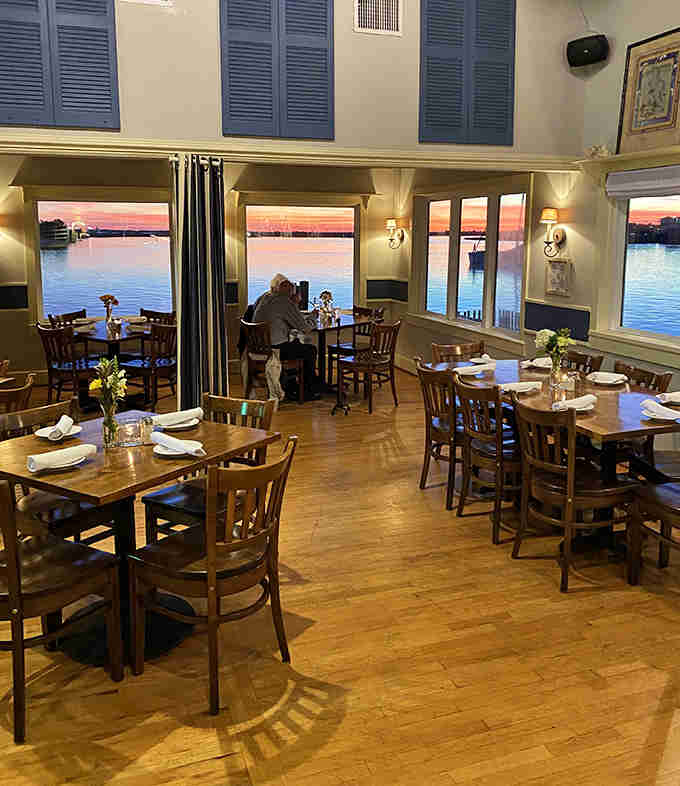 Floor-to-ceiling windows framing sunset views over the water while you dine? This is vacation mode activated, friends.